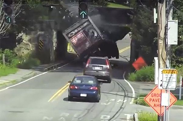 Truck Driver Hits Infamous Low Bridge aka 'Can Opener' - ThrottleXtreme